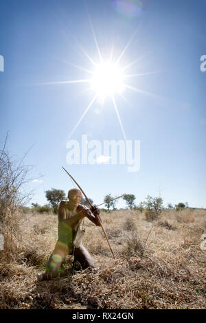 KUNG BUSHMAN hunting with bow & arrow North eastern Namibia, south ...