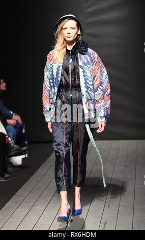 Lisbon, Portugal. 8th Mar, 2019. A model presents a creation of ...