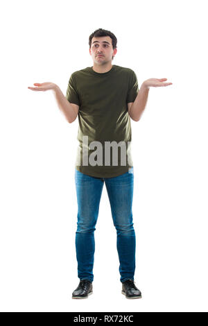 Full length portrait of confused young man carrying heavy packages ...