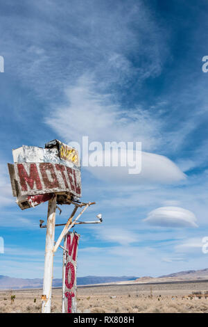 The Rustic Oasis Motel sign with a lenticular cloud formation behind it ...