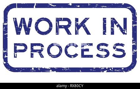 Grunge green work in process with star icon round rubber seal stamp on ...