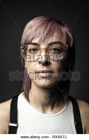 A Hispanic non-binary person posing while traveling in Europe Stock ...