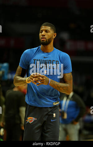 Oklahoma City Thunder forward Paul George (13) passes around Memphis ...