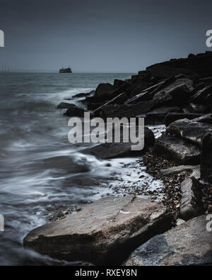Long exposure of sea and rocks Stock Photo - Alamy