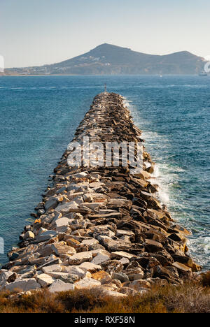 Stony breakwater in sea. Breakwater surround docks, ports and lagoons ...