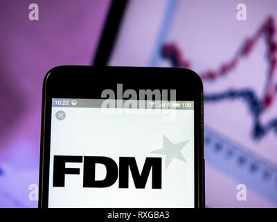 FDM Group company logo seen displayed on smart phone Stock Photo - Alamy