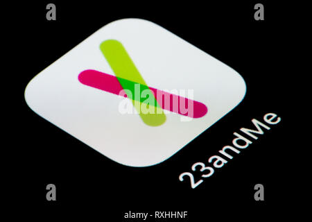 A close-up shot of the 23andMe app icon, as seen on the screen of a ...