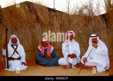 Dubai Arab folklore and history with a group of Emirati men performing ...