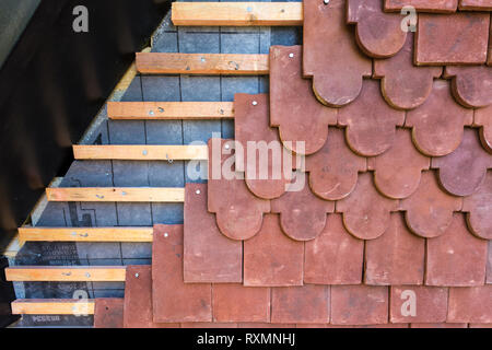 Vertical exterior wall hanging clay tiles Stock Photo - Alamy