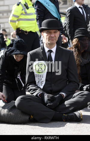 Climate change activists are seen at the Downing Centre Local Court in ...