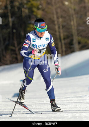 Krista Parmakoski, of Finland, competes in the cross-country women's ...