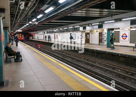 Interior of London Underground Circle Line train approaching station ...