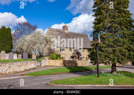 St Peters church Isham, civil parish in Northamptonshire, England Stock ...