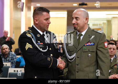 After ten years, Polish soldier Marcin Kulas (right) and U.S. soldier Corey Speck met in Prague ...