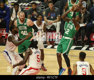 Boston Celtics guard Terry Rozier (12) shoots over Indiana Pacers guard ...