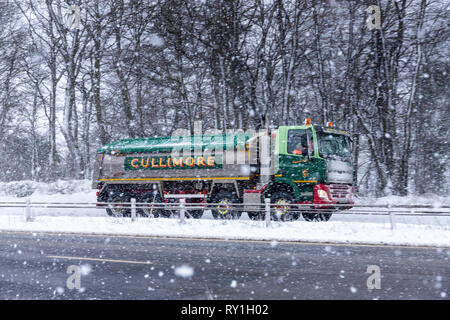 Gritting truck, lorry on snow covered road Kent, England Stock Photo ...