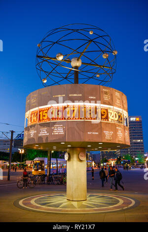 A vertical shot of the world time clock and Berlin TV tower Alex at ...
