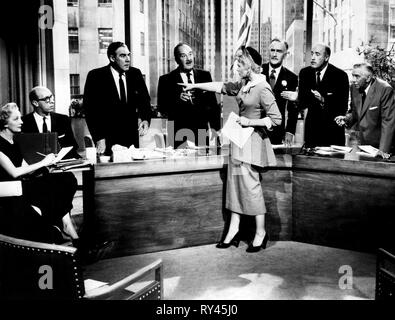 THE SOLID GOLD CADILLAC, director Richard Quine (right) with wife ...