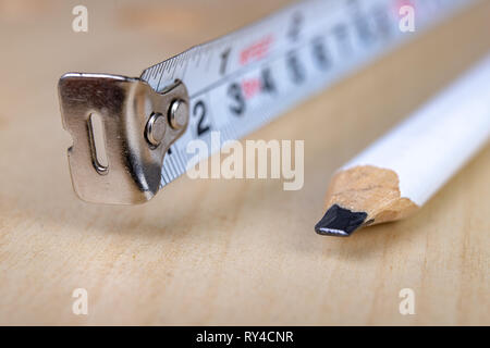 Steel measure and pencil used for measuring in carpentry. Diy ...