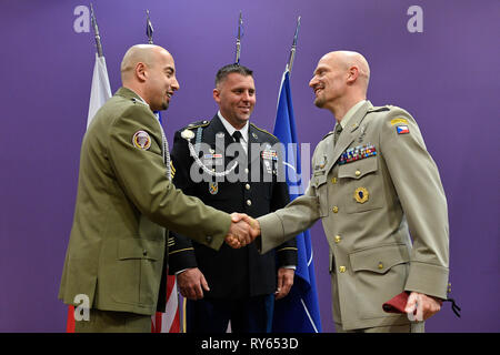 After ten years, Polish soldier Marcin Kulas (right) and U.S. soldier Corey Speck met in Prague ...
