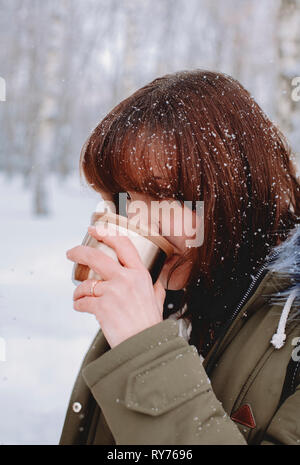 Young woman drinking tea during fever Stock Photo - Alamy