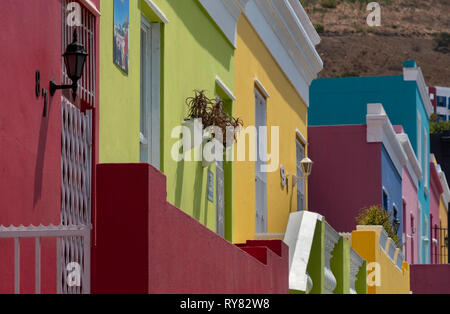 Row of brightly painted multicoloured houses in Whitehead, Northern ...