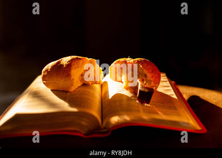 Communion cups and bread represent the last supper of Jesus, a symbolic ...