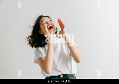 Do not miss. Young casual woman shouting. Shout. Crying emotional woman ...