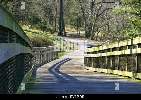 The Neuse River hiking and biking trail as it passes below a set of ...