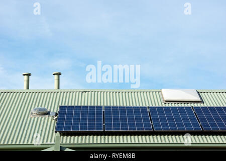 Australian photovoltaic solar power panels on a suburban rooftop Stock ...