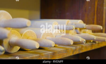 The rolling pins on the shelf of the kitchen used for rolling doughs in ...