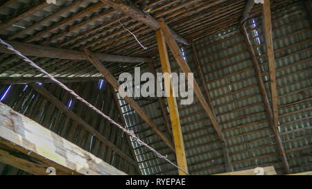 The closer look of the roof ceiling of the factory and the railings on ...