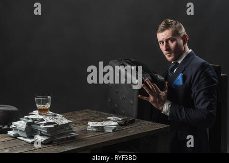 Man in suit. Mafia. Making money. Money transaction. Businessman work ...