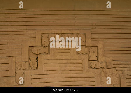 Relief of zoomorphic motifs on adobe wall. Chan Chan, ancient capital ...