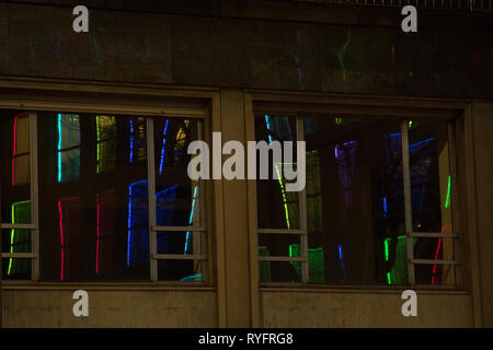 The different coloured window lights of the LaGare Hotel, Milano ...