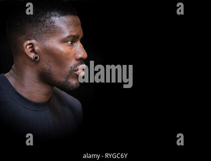 Young handsome African man against white background Stock Photo - Alamy