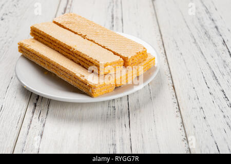 wafer blocks on white wood background Stock Photo - Alamy