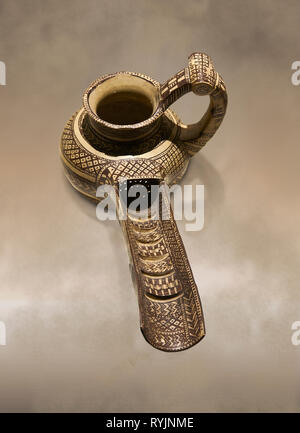 Phrygian terra cotta pottery vessel with a strainer and long pouring ...
