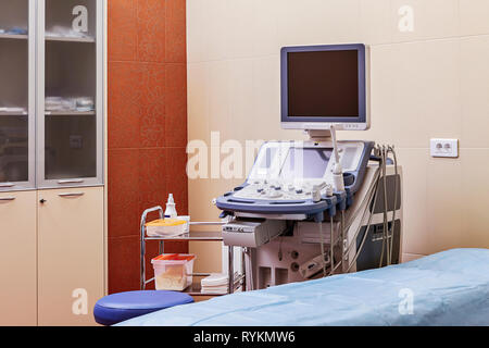 Interior of medical room with ultrasound diagnostic equipment. in the ...