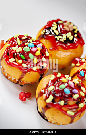 A cupcake with white chocolate toppings Stock Photo - Alamy