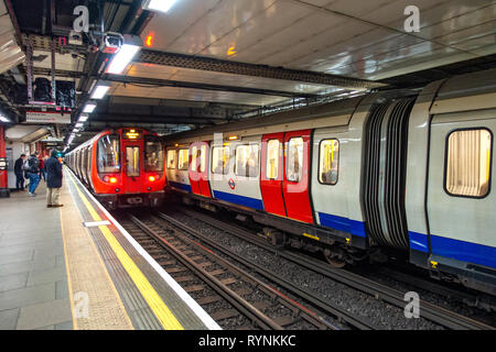 Two London Underground Tube Trains side by side at a platform in London ...