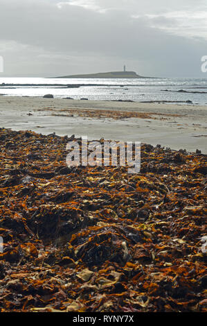Pladda lighthouse viewed from Kildonan beach on the southern tip Of ...