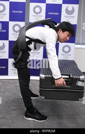 A Power Assist Suit developed by Panasonic is demonstrated as part of ...