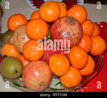 Colorful shiny fresh fruits. Oranges on the shelf of a supermarket or ...