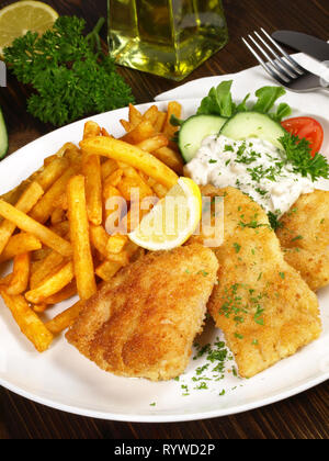Coalfish Filet with Chips Stock Photo - Alamy