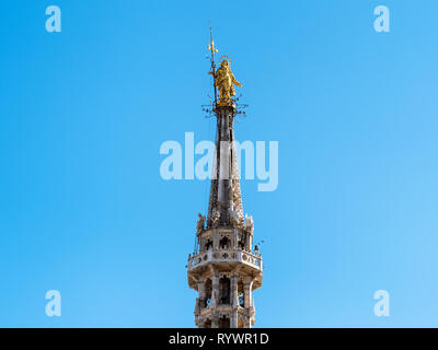 The Madonnina. a statue of the Virgin Mary atop Duomo Milano (Milan ...