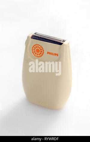 Vintage Philips green electric shaver, isolated on white background ...