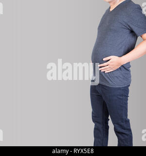 The belly skin men with excess fat Stock Photo - Alamy
