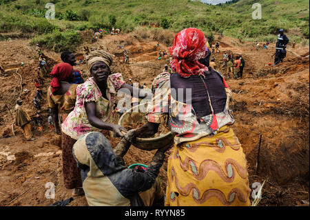 Female artisanal miners at a gold mine near Iga Barriere, Ituri ...