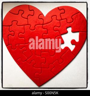 Heart shaped puzzle with missing piece - Concept of love and troubles ...